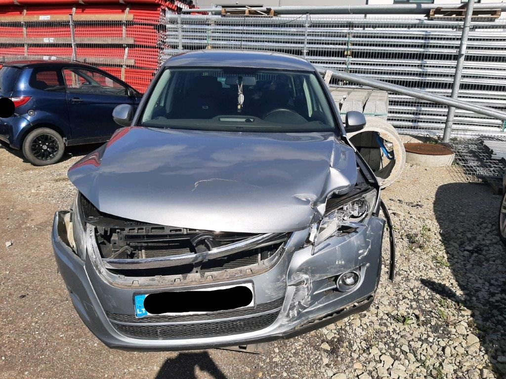 Naudotas Volkswagen Tiguan Bagažinės dangčio spynelės laikiklis 1T0827517A